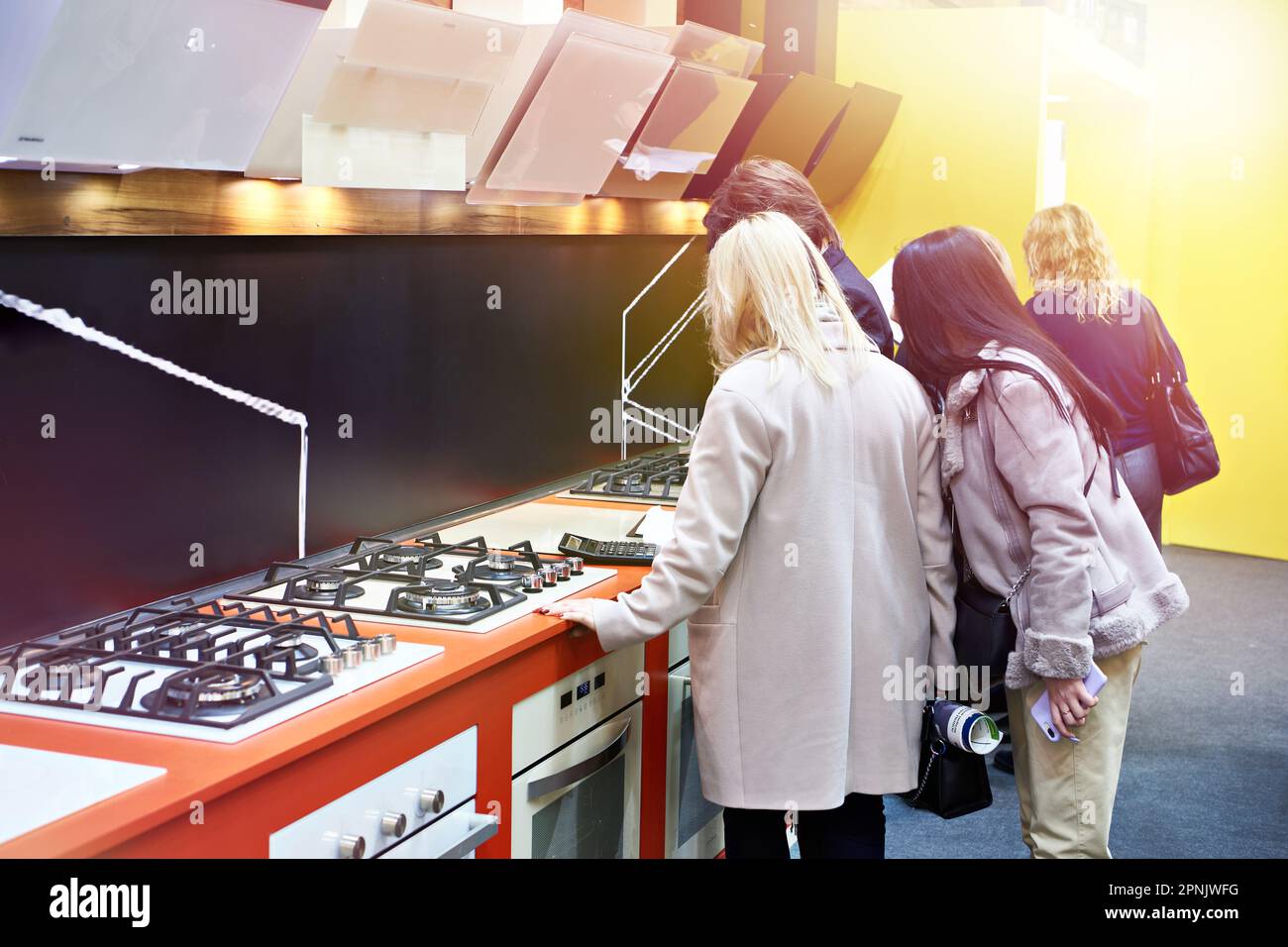 Woman home appliances sale hi-res stock photography and images - Alamy