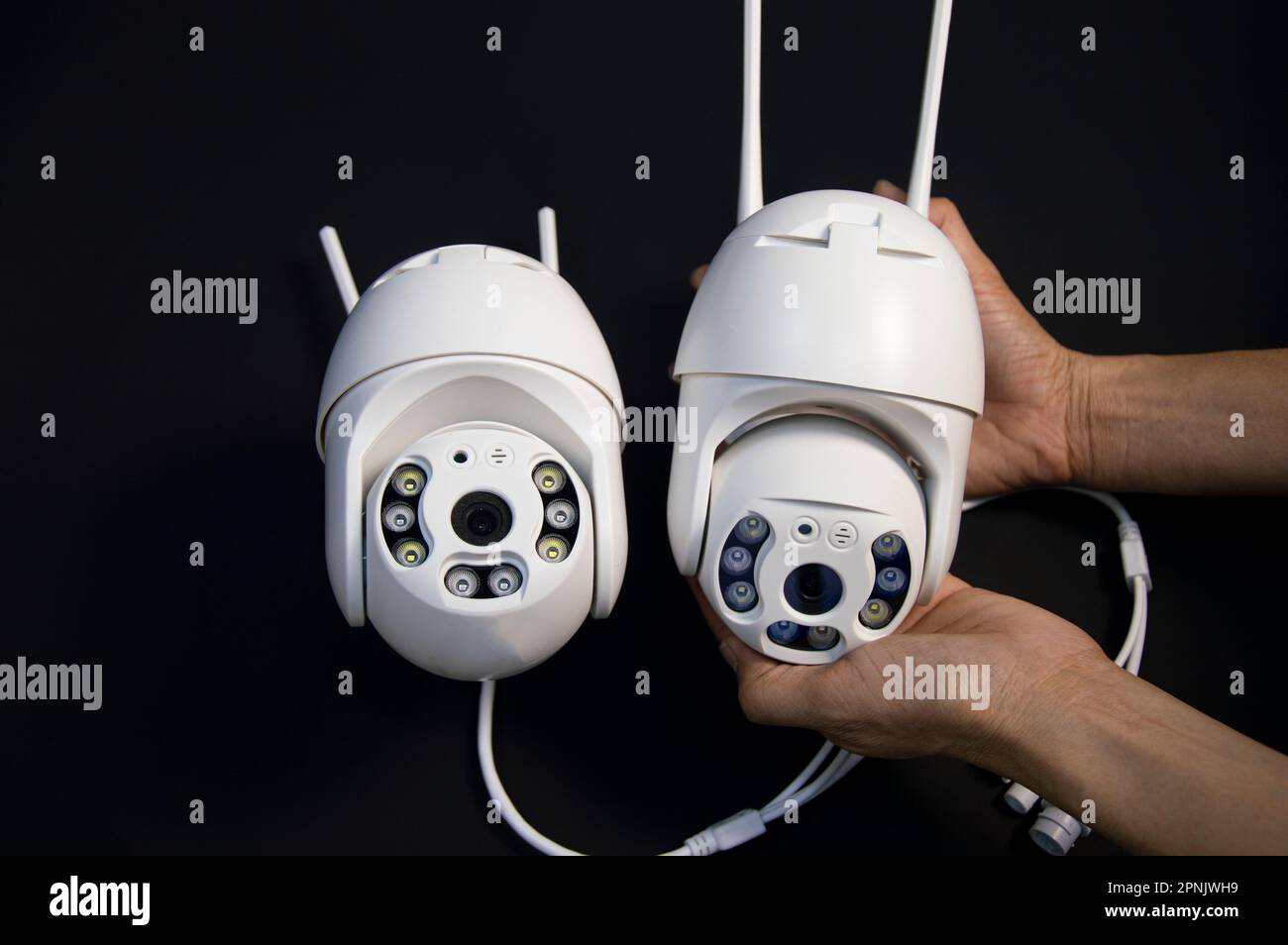 Person with two cameras hi-res stock photography and images - Alamy