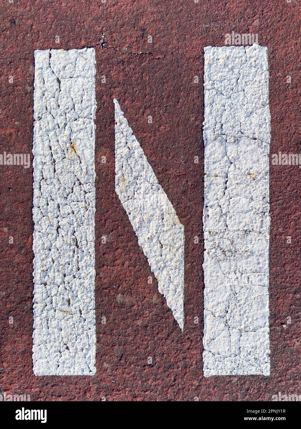Letter N stenciled on the pavement Stock Photo - Alamy