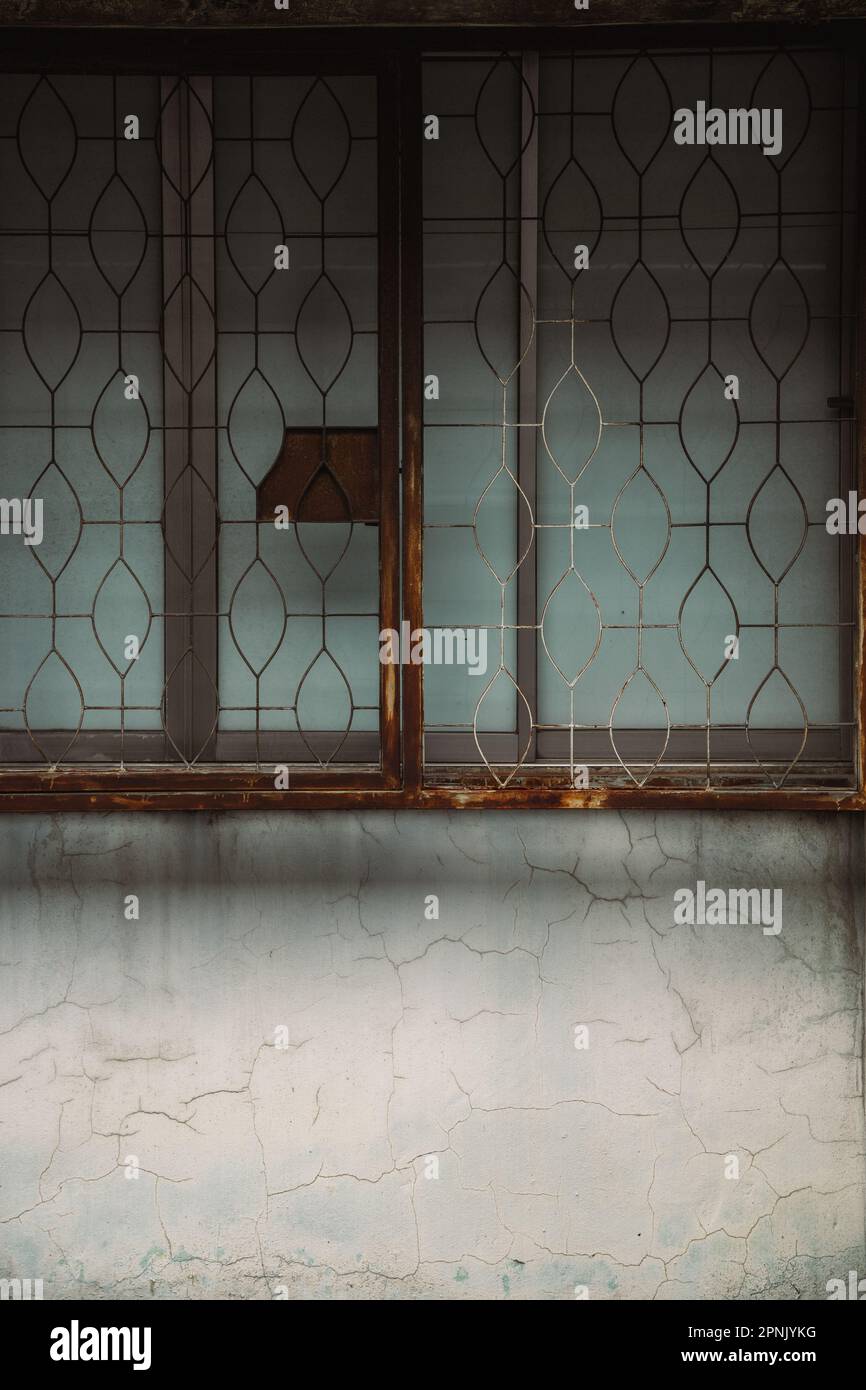 An old, weathered window frame with multiple panes Stock Photo - Alamy