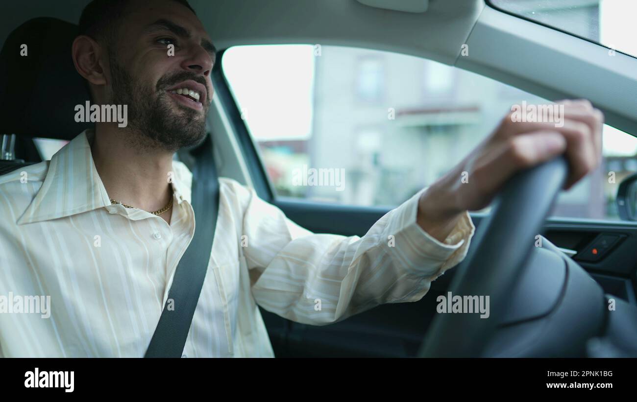 One Arab young man driving car. A Middle Eastern male person drives ...