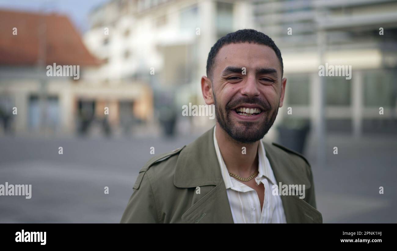 One expressive happy Middle Eastern man laughing and smiling. Authentic ...