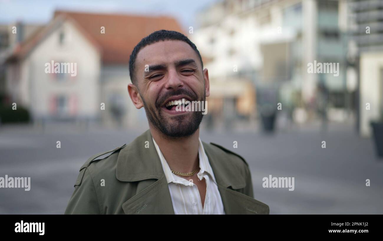 One expressive happy Middle Eastern man laughing and smiling. Authentic ...