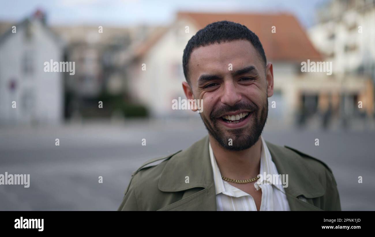 One expressive happy Middle Eastern man laughing and smiling. Authentic ...