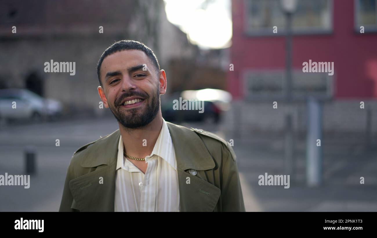 One happy Arab man walking forward toward camera. Tracking shot in ...