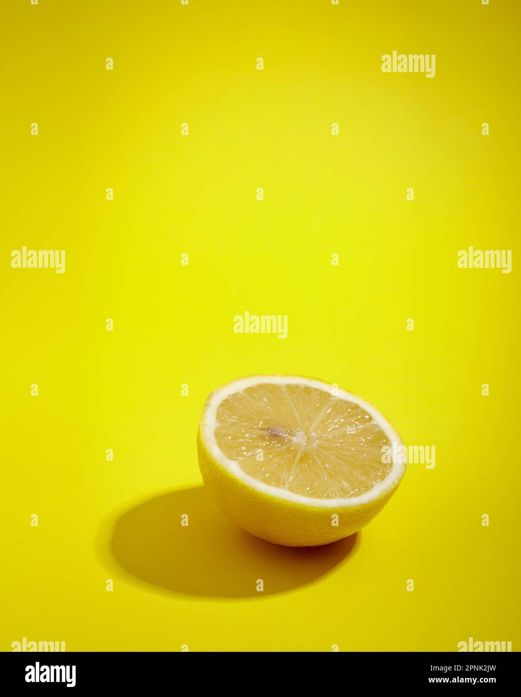 lemon on solid background Stock Photo - Alamy