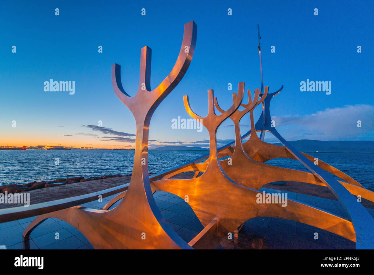 SÓLFARIÐ, Sun Voyager sculpture by Jon Gunnar Arnason at dusk in ...