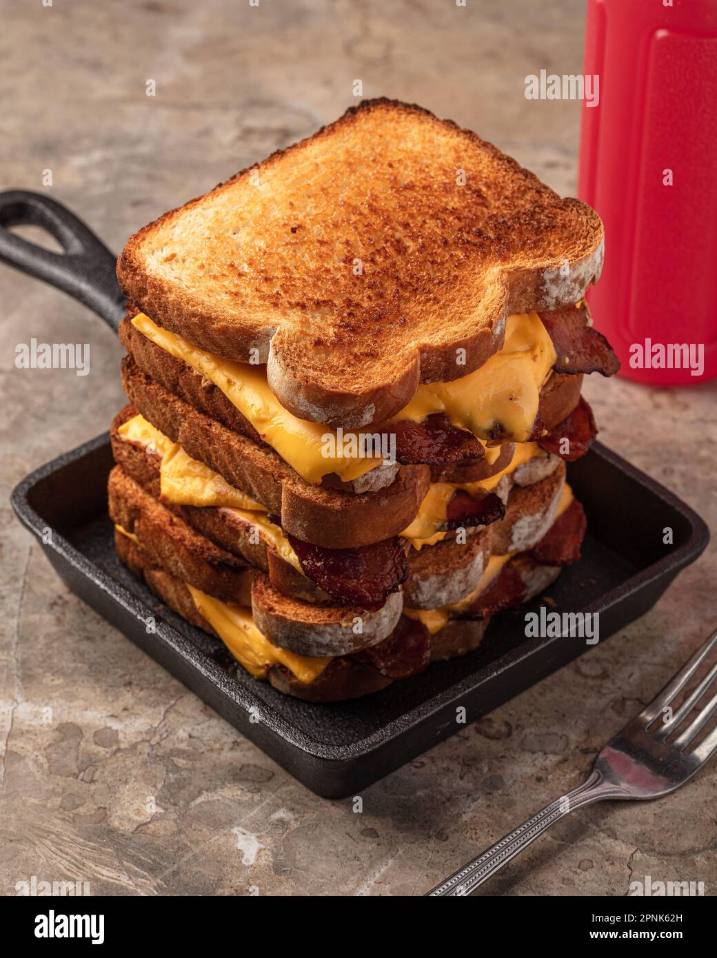 Grilled cheese on small pan Stock Photo - Alamy