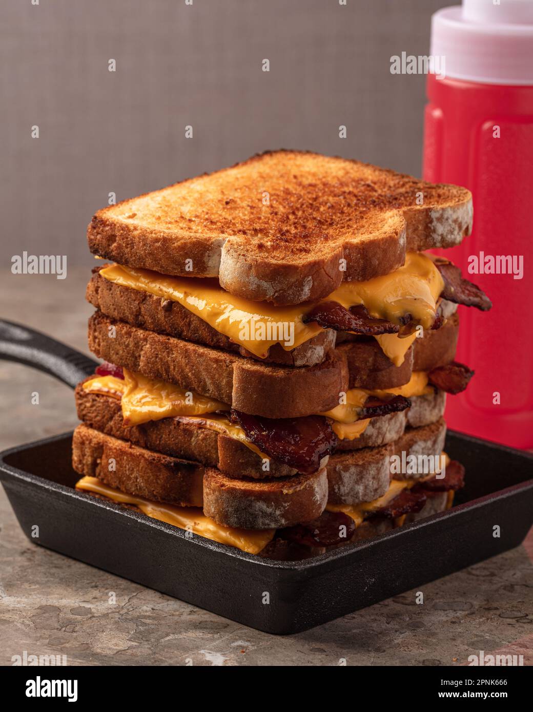 Grilled cheese on small pan Stock Photo - Alamy