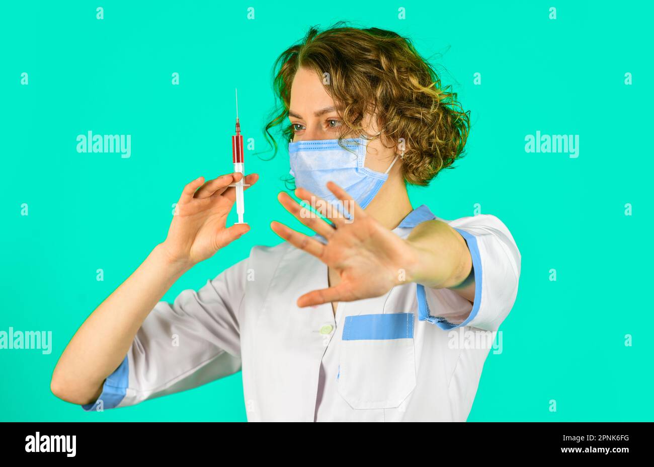 woman nurse with stethoscope. researcher holding flu vaccine. Doctor ...