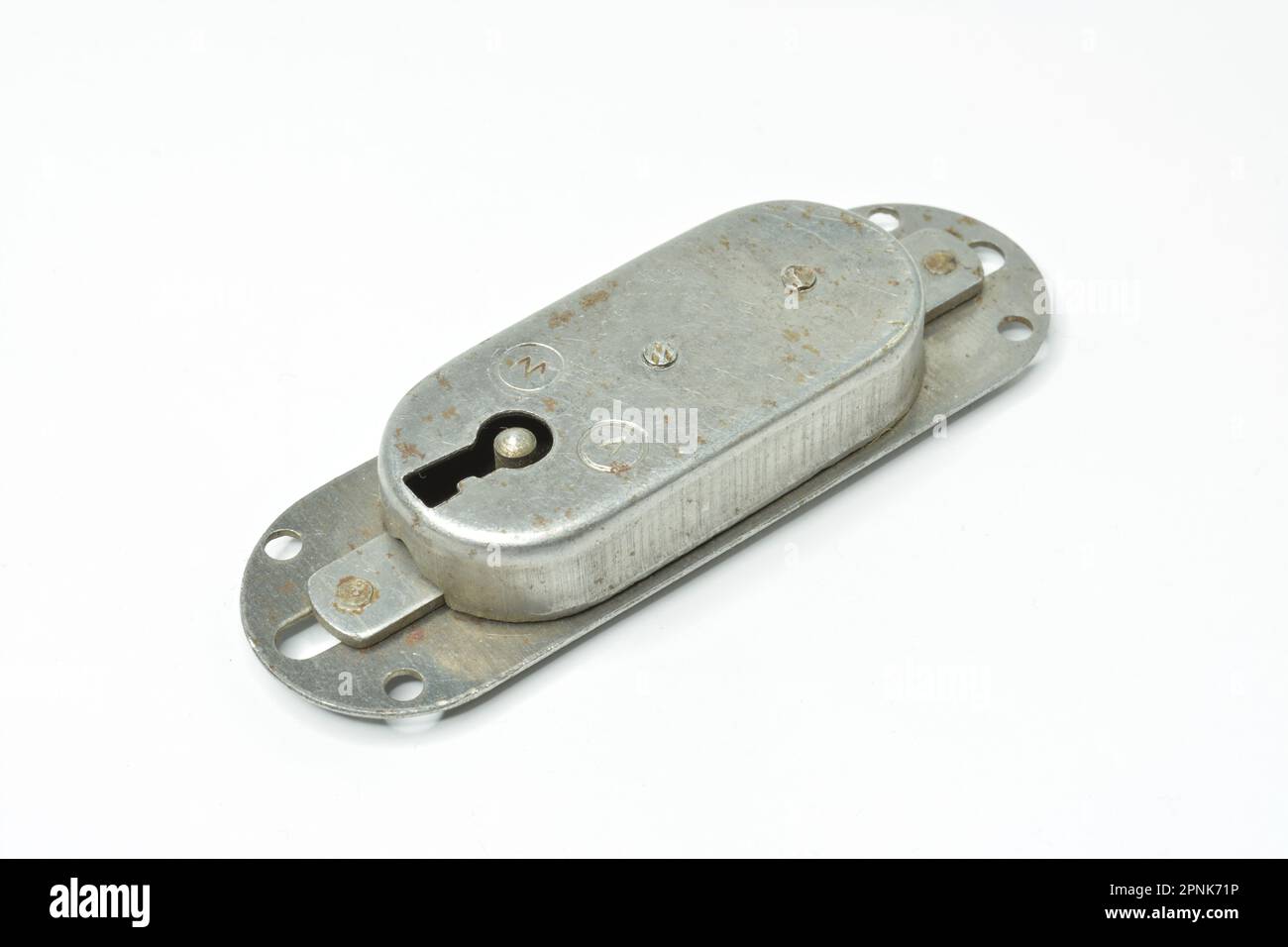 Vintage metal door lock mechanism on gray background Stock Photo - Alamy