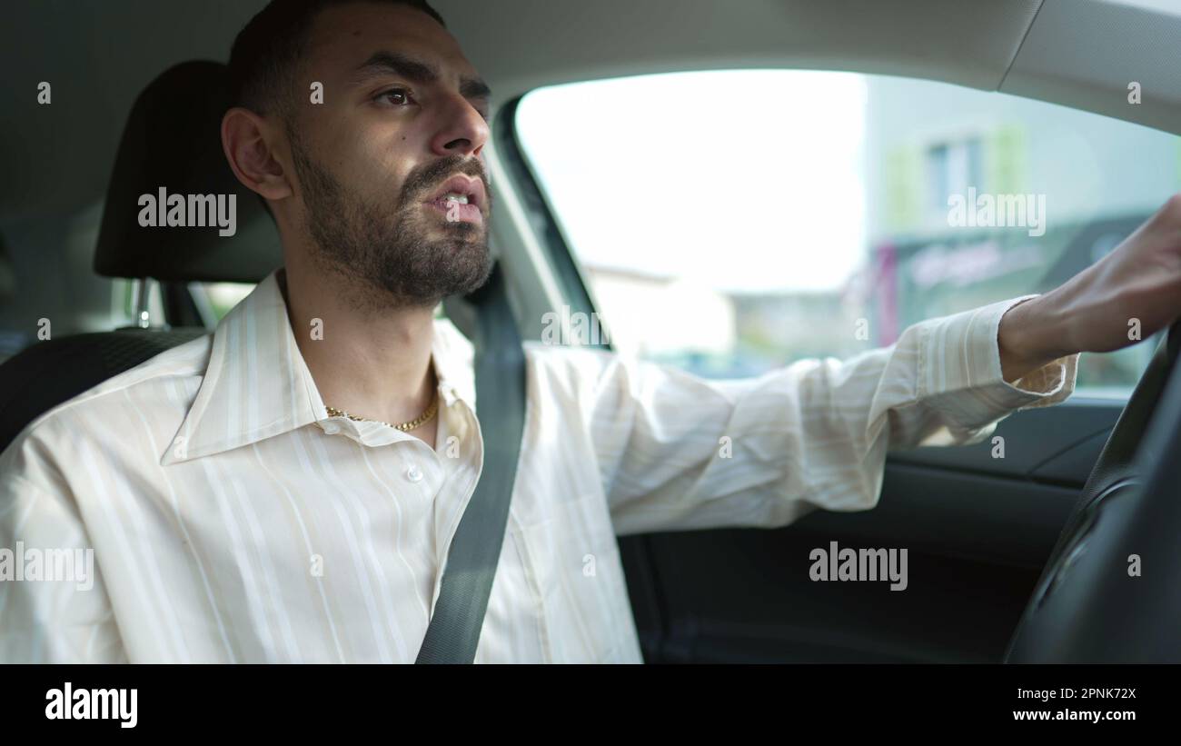 One young Arab man driving car. A Middle Eastern Moroccan male person ...