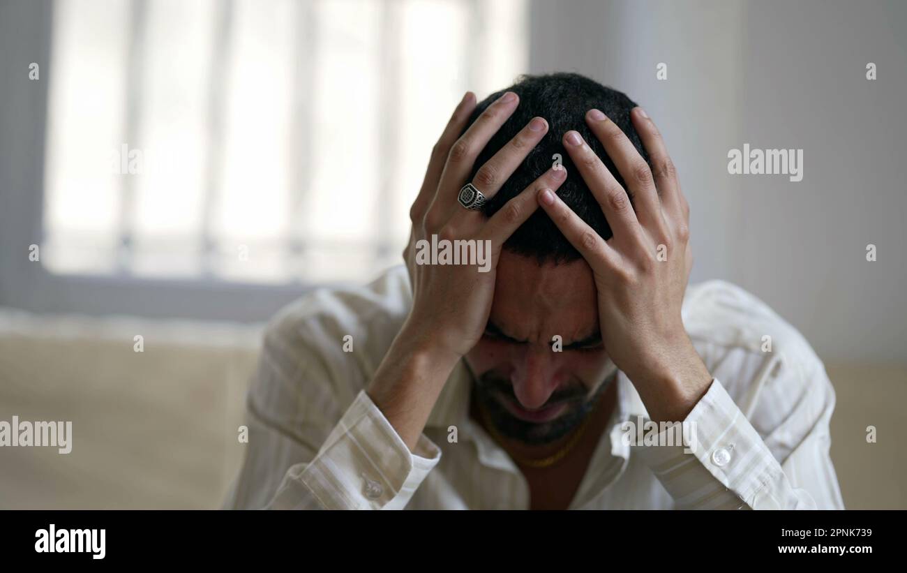 One troubled young man struggling with mental health issues at home ...