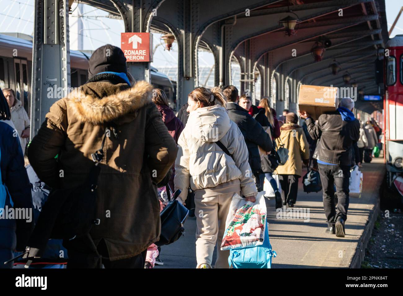 People getting on and off the train at Bucharest North Railway Station ...