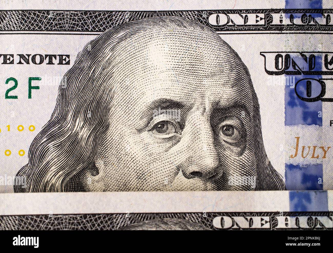 Extreme close-up of one hundred bill Franklin portrait. Macro. American ...