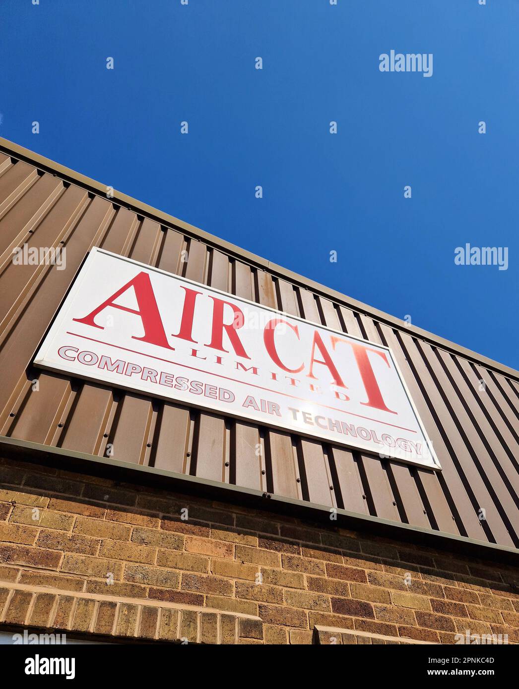 Company business name on a factory wall Stock Photo - Alamy