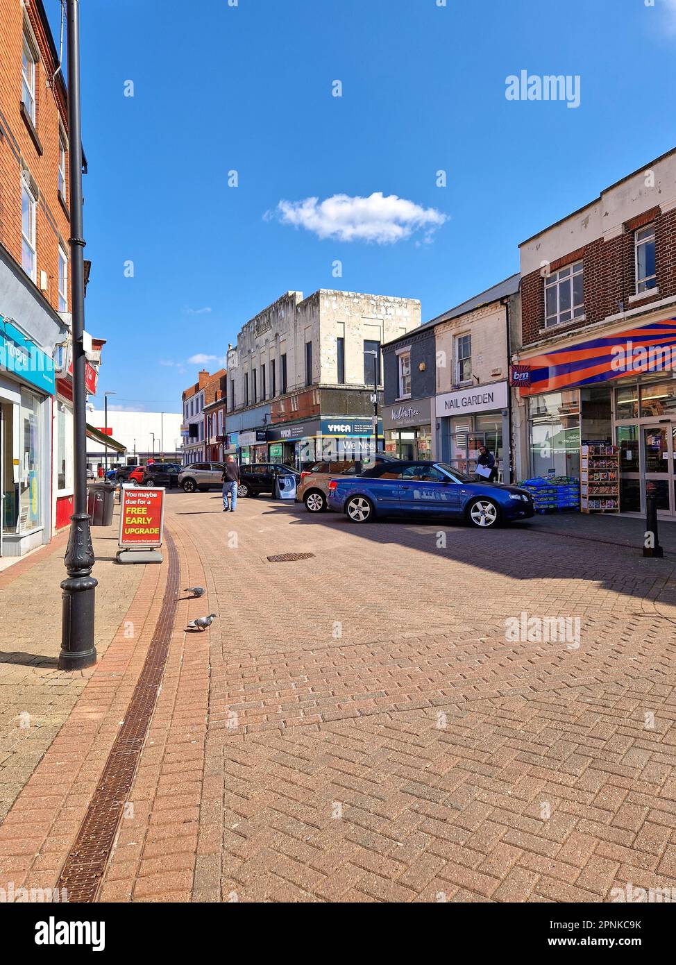 Cars parked on pedestrian high street example Stock Photo - Alamy
