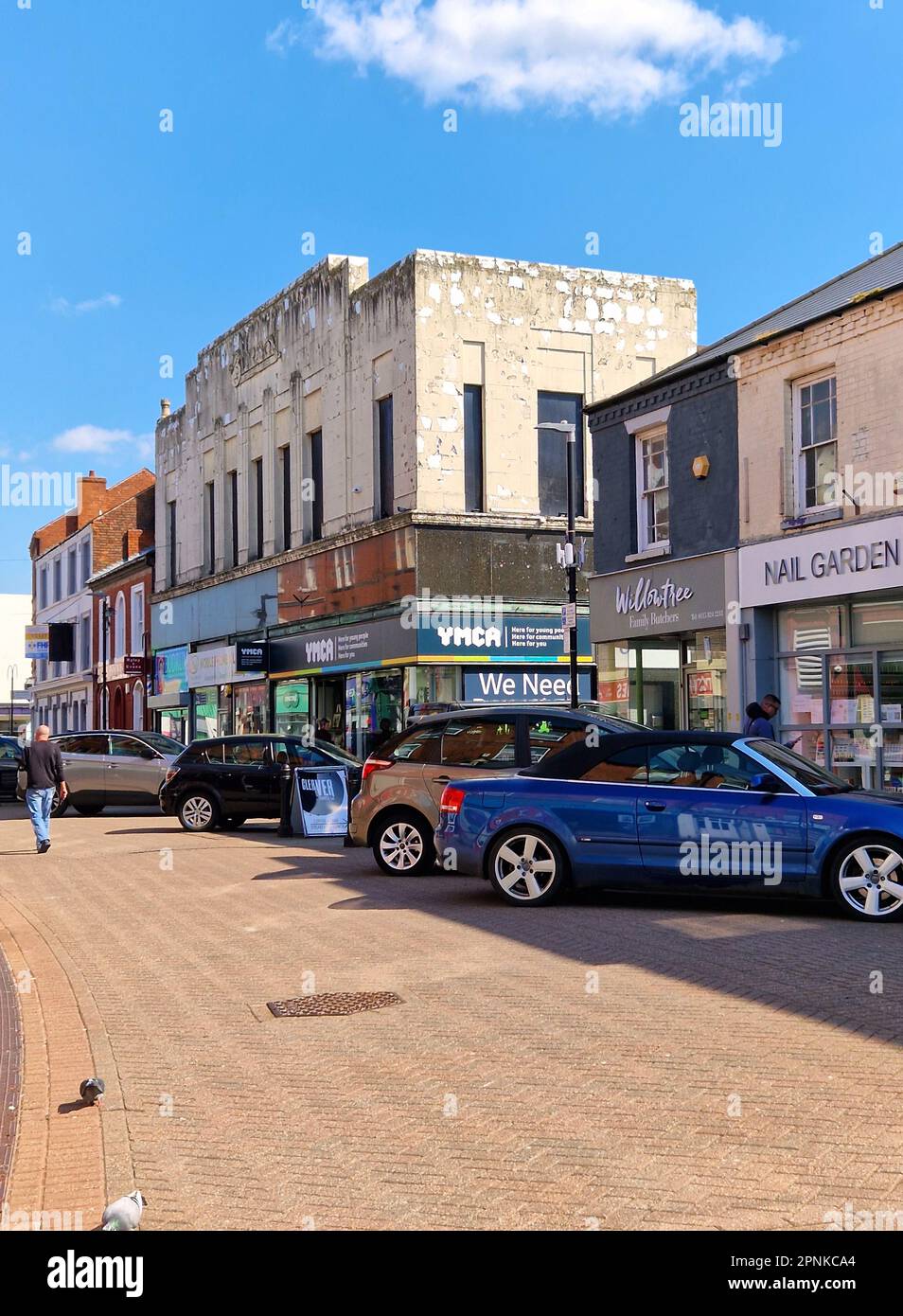 Cars parked on pedestrian high street example Stock Photo - Alamy