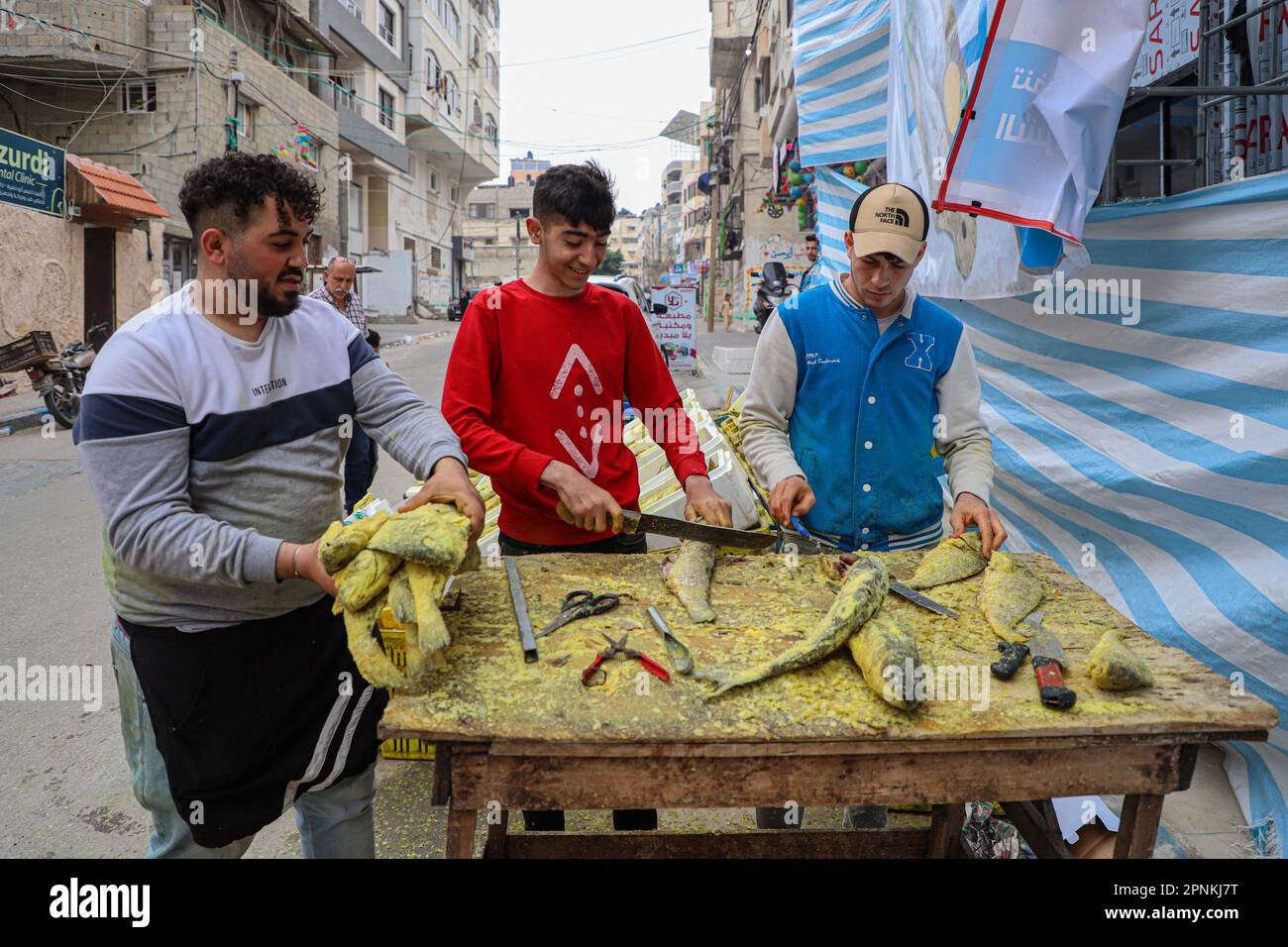 Gaza. 19th Apr, 2023. Palestinian vendors sell salted fish known as ...