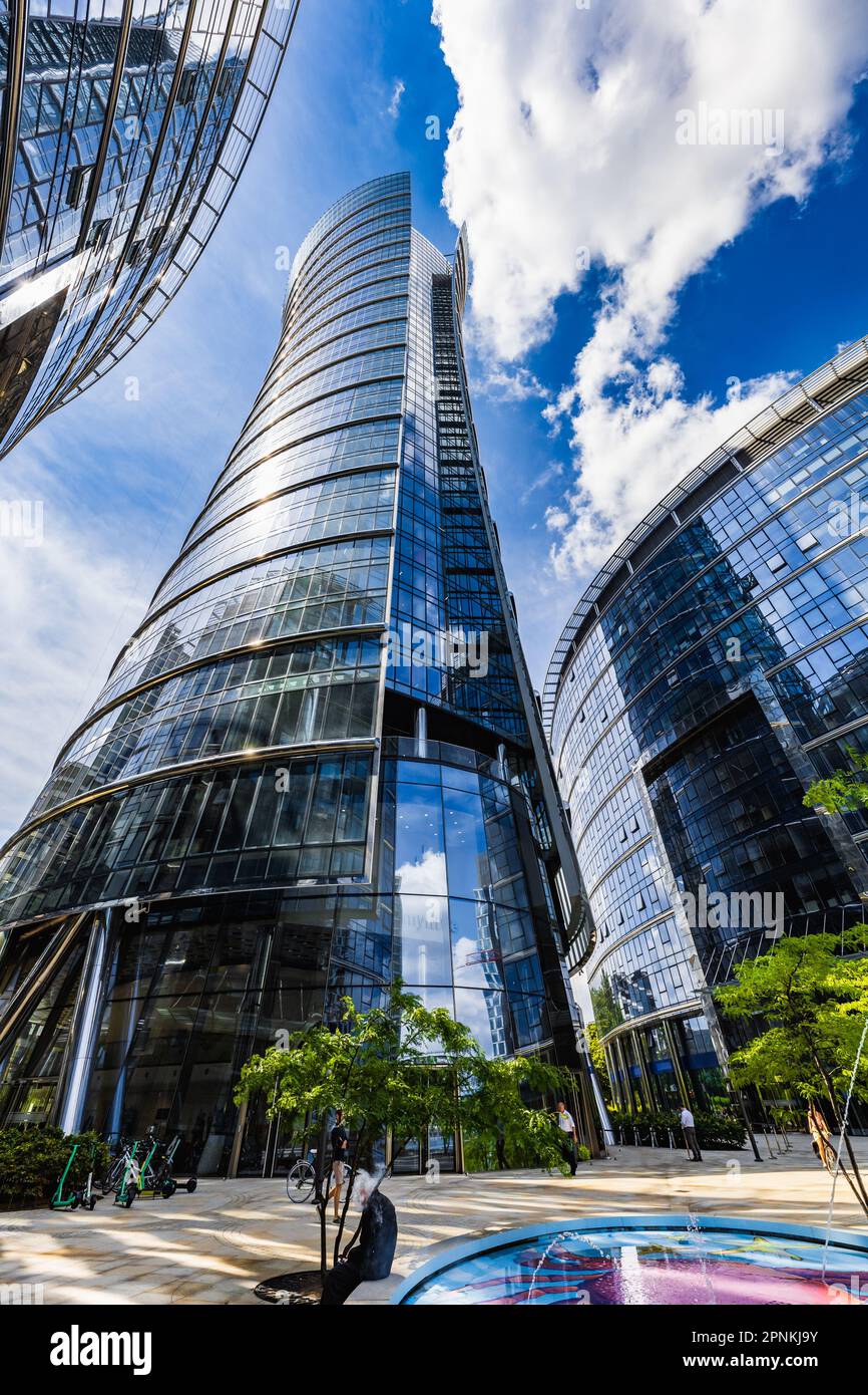 Warsaw, Poland - July 2022: A corporate district with many tall glass ...
