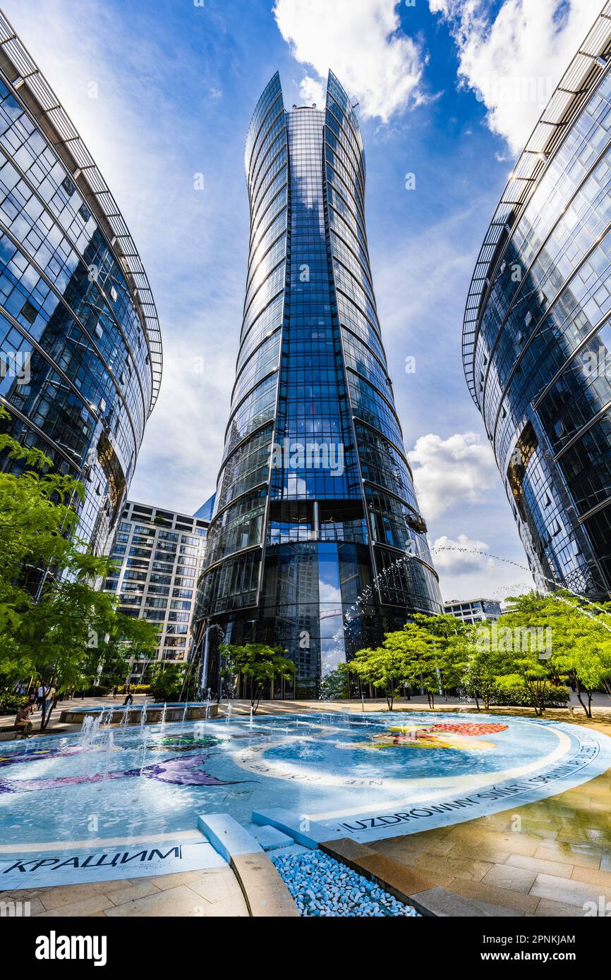 Warsaw, Poland - July 2022: A corporate district with many tall glass ...