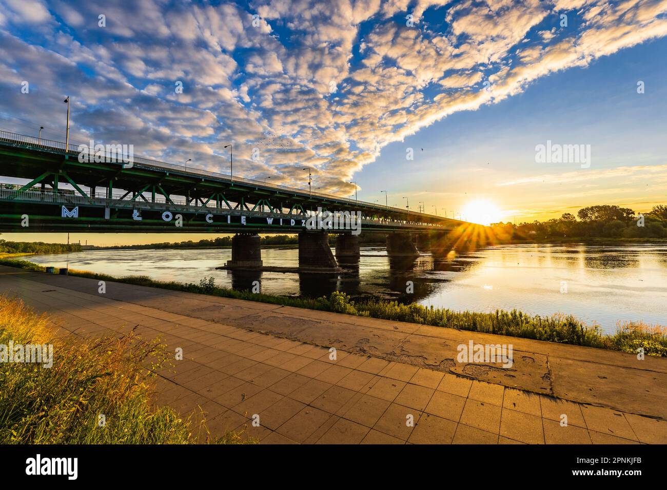Warsaw, Poland - July 2022: The green Gdansk bridge with the ...
