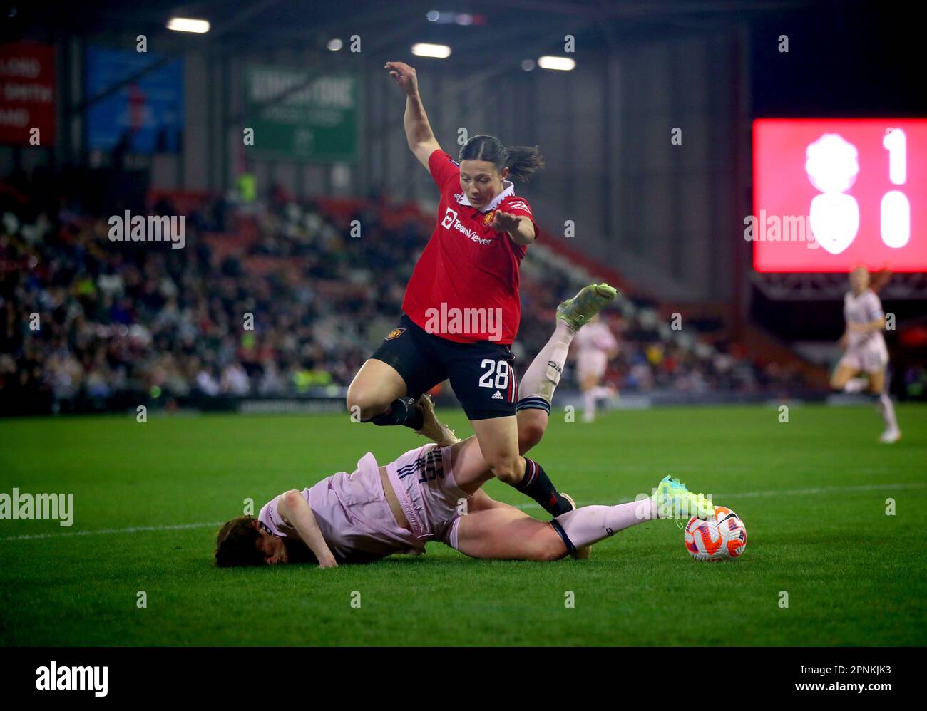 Manchester Uniteds Rachel Williams Top And Arsenals Jennifer Beattie Go Down Whilst Battling