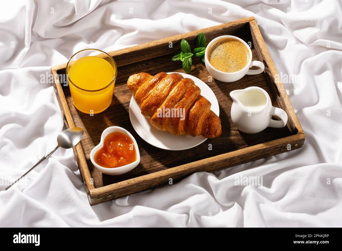Breakfast in bed on a sunny morning Stock Photo - Alamy