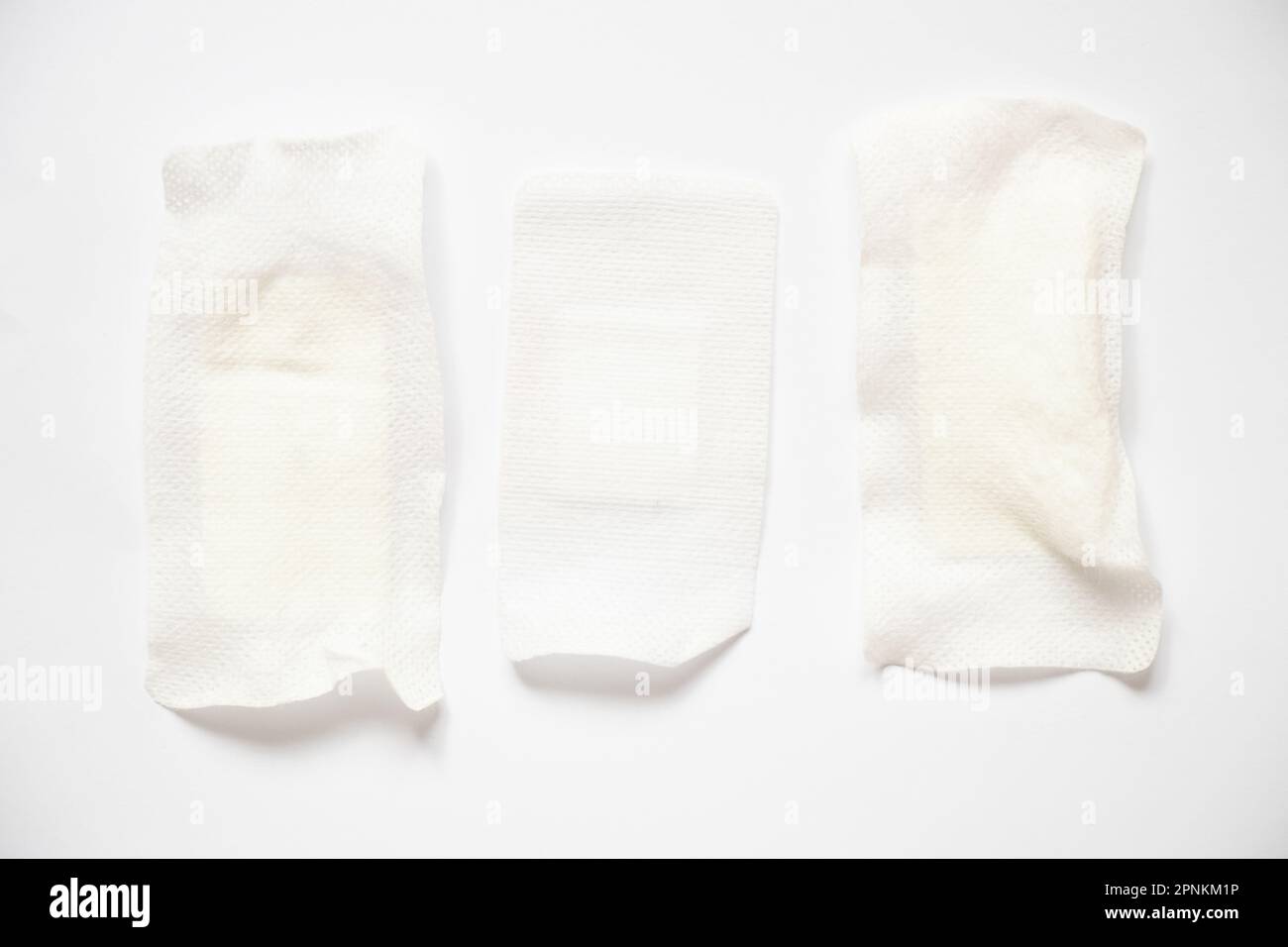 White medical plaster used on a white background Stock Photo - Alamy