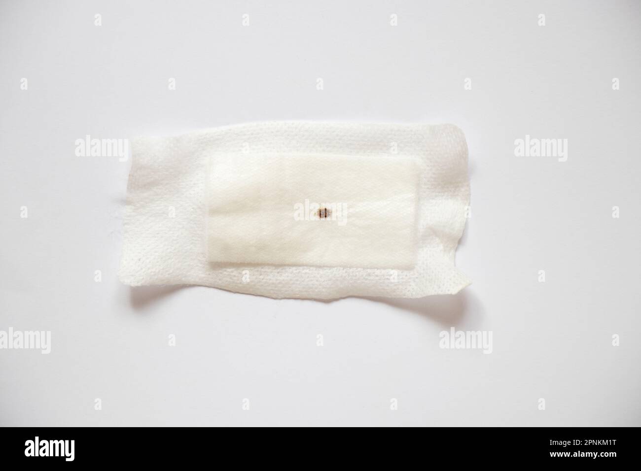 White medical plaster used on a white background Stock Photo - Alamy