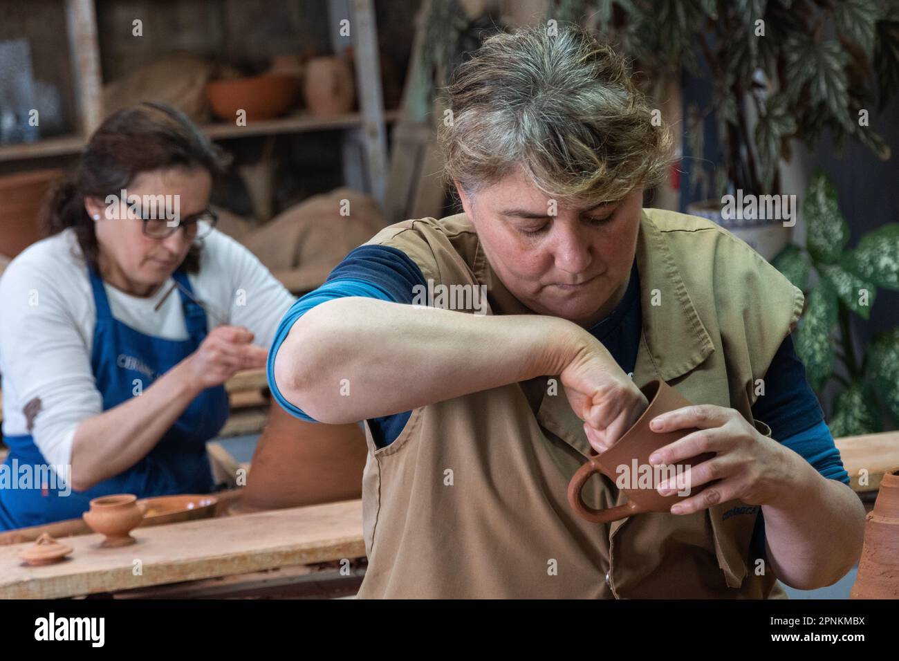 Artisans hand craft traditional Azorean pottery at the Ceramica Vieira ...