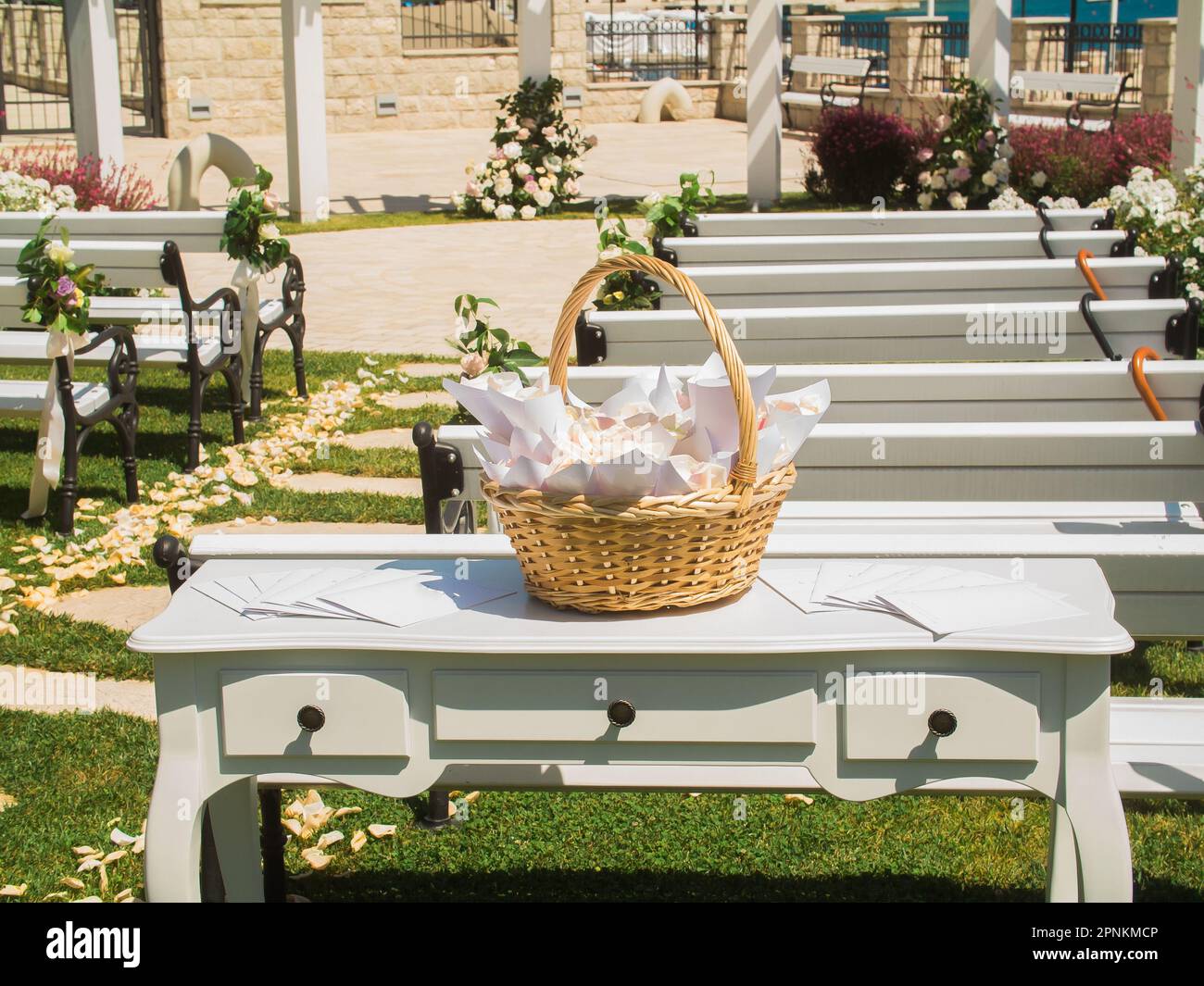 Basket with petals for guests in outdoor wedding ceremony Stock Photo ...