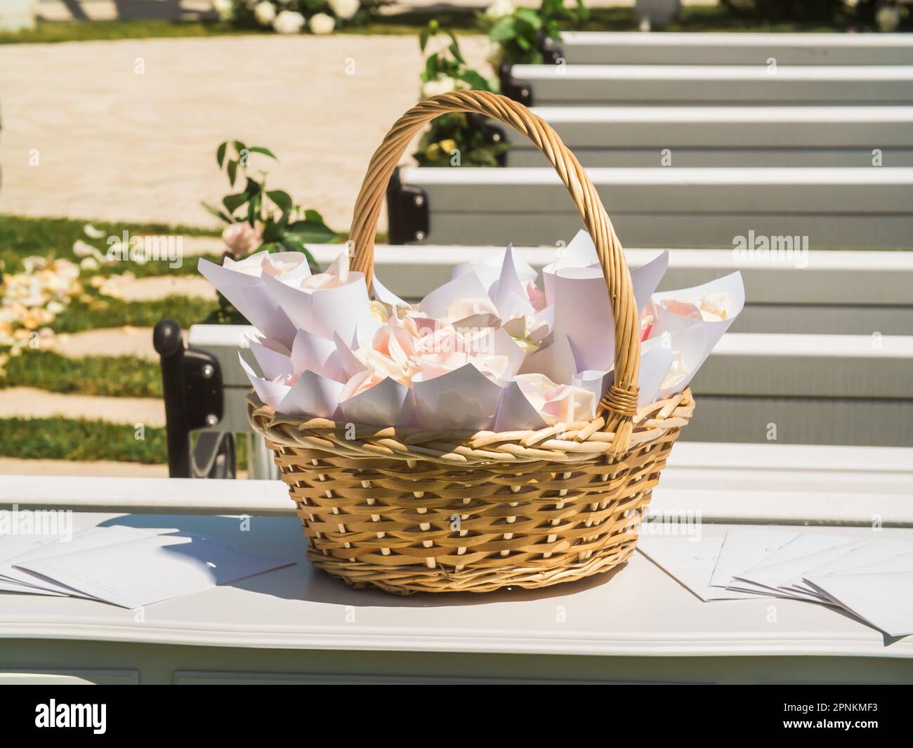 Basket with petals for guests in outdoor wedding ceremony Stock Photo ...