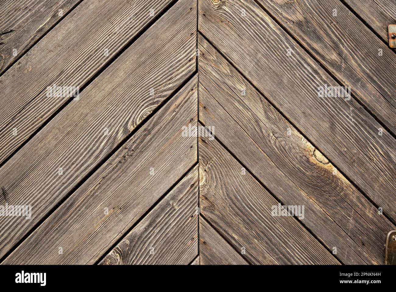 Diagonal patterned wooden background texture, showing the planks of the ...