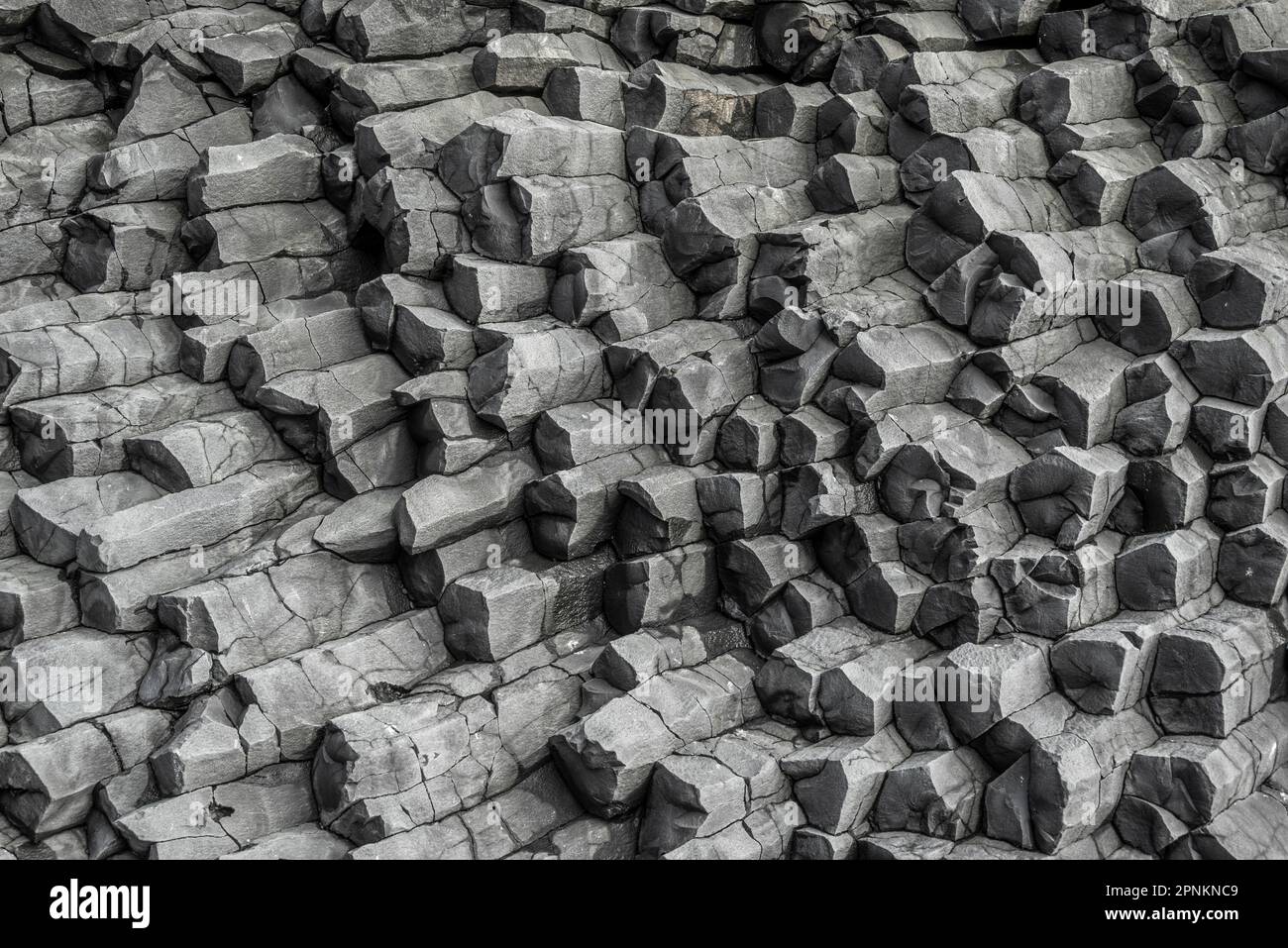 Natural geometric background pattern showing the black hexagonal basalt ... Natural geometric background pattern showing the black hexagonal basalt ...