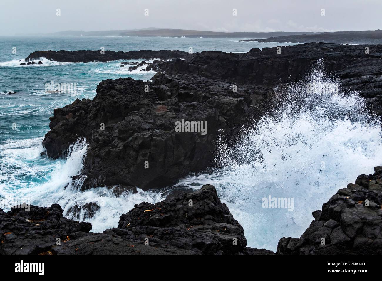Powerful surf at Brimketill rock pool, with huge sea waves crashing ...