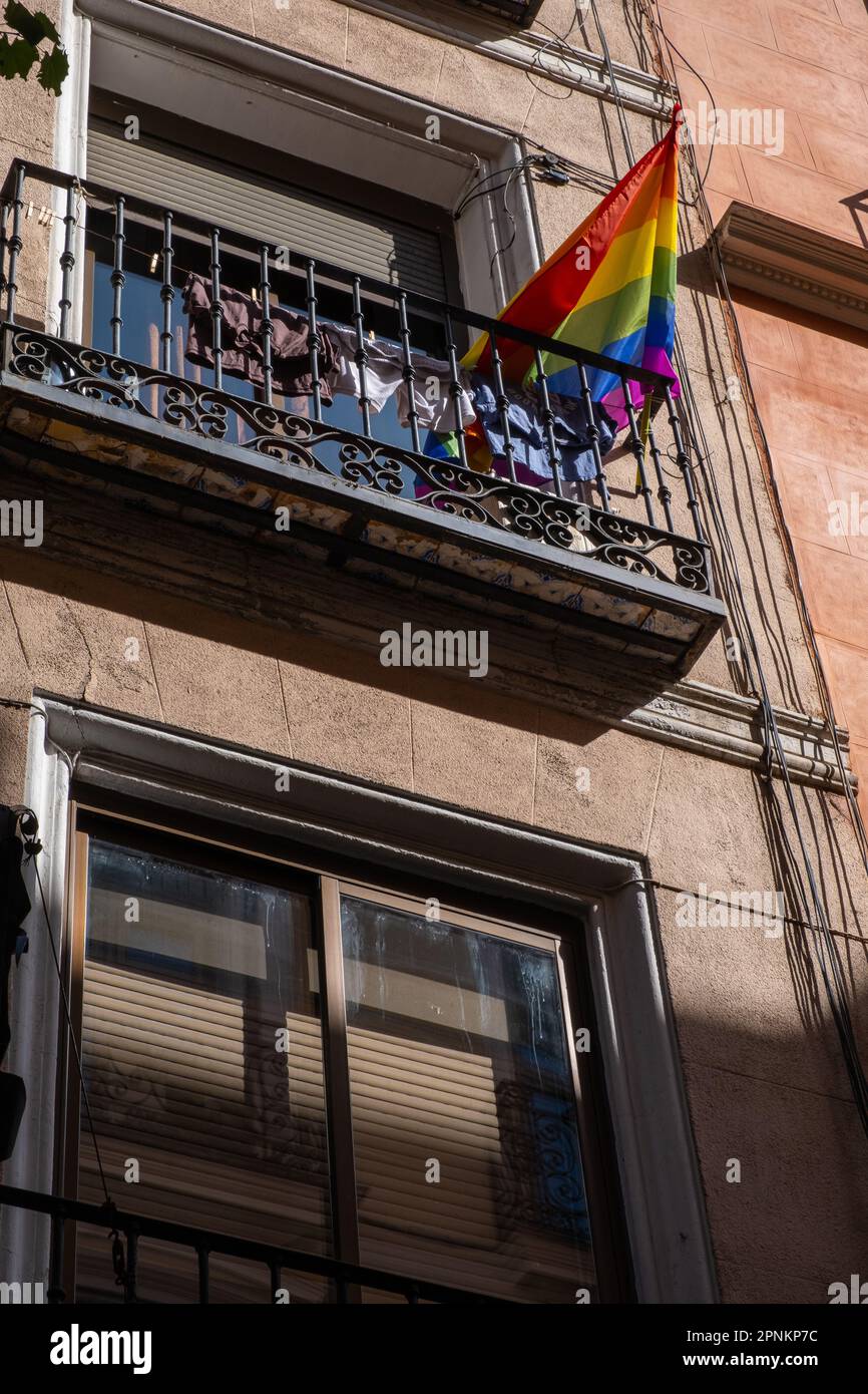 Rainbow flag on the balcony of a house in Madrid, Chueca neighborhood ...