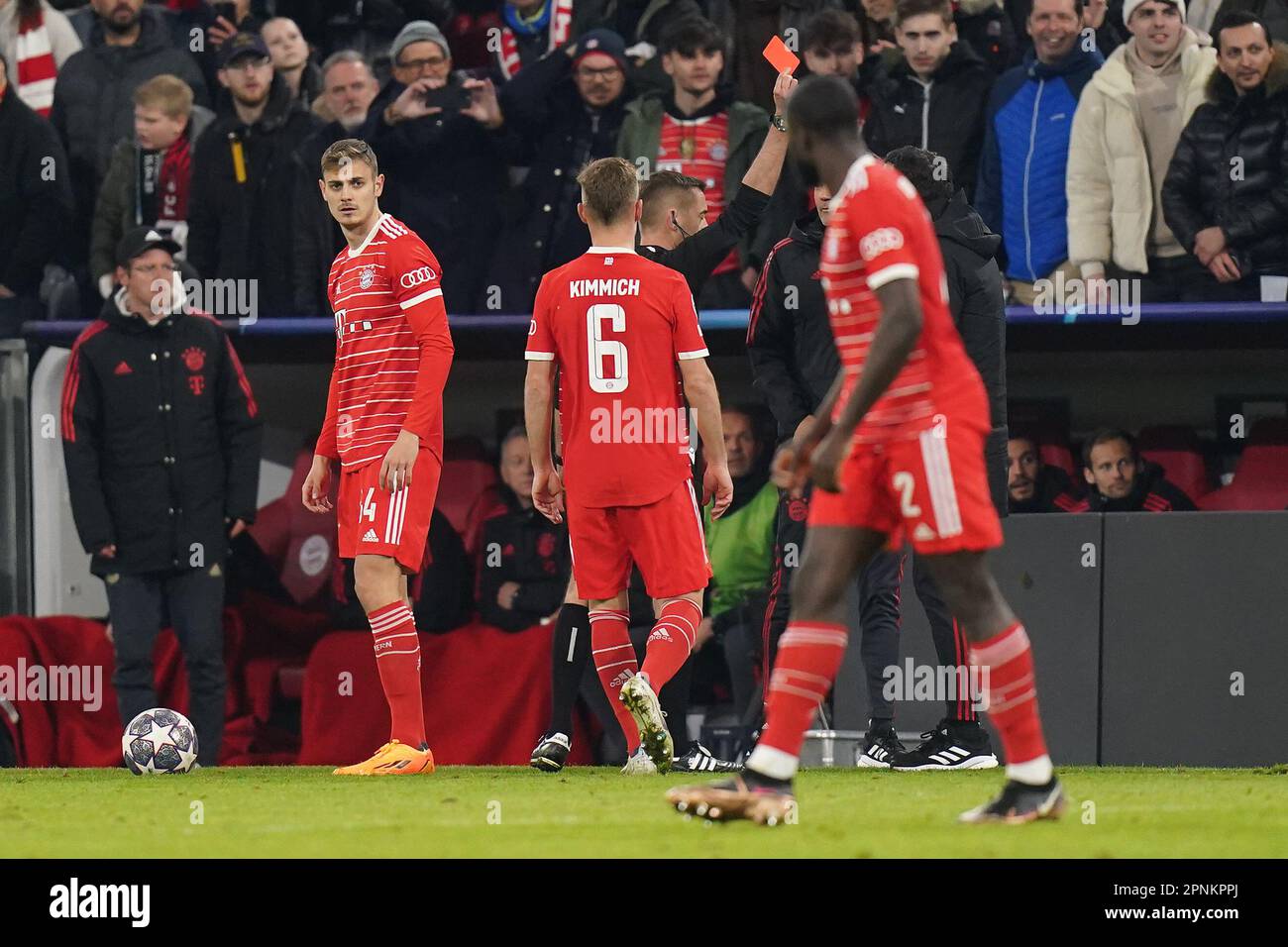 Referee Clement Turpin shows a red card to Bayern Munich manager Thomas ...