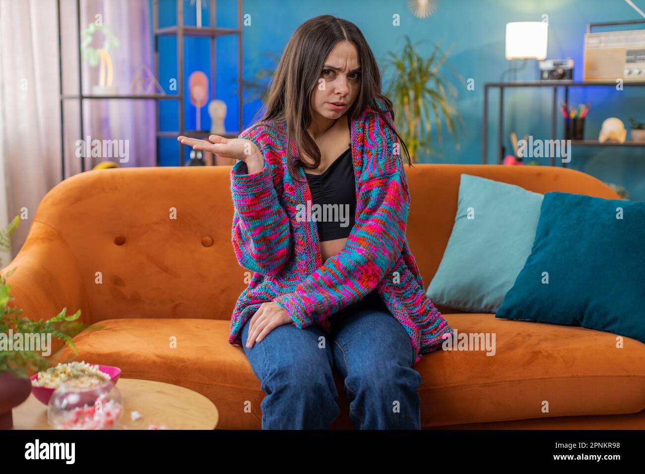 What. Why. Caucasian woman raising hands in indignant expression asking ...