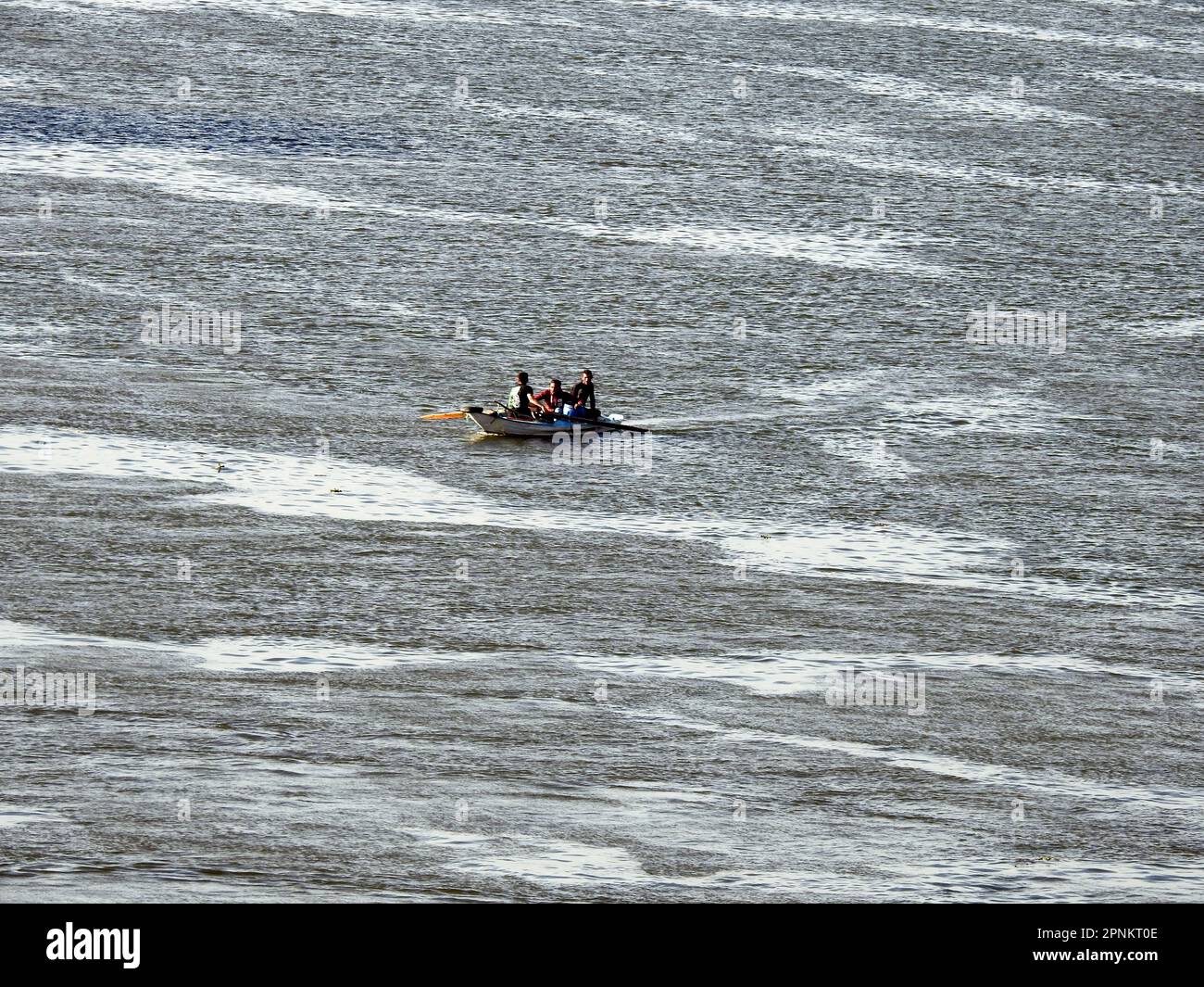 Cairo, Egypt, April 16 2023: A small primitive wooden boat sailing in ...
