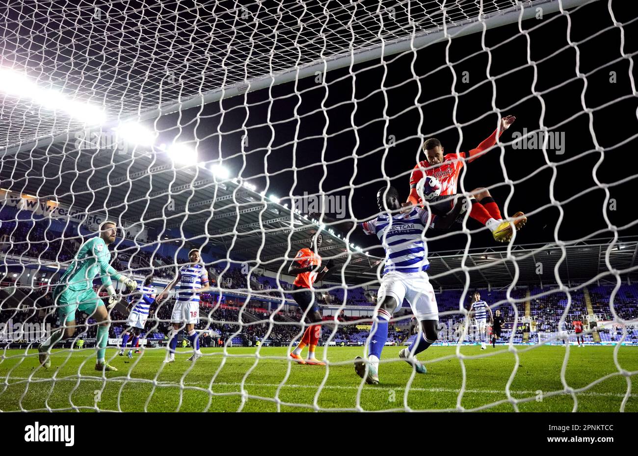 Reading goalkeeper Joe Lumley is left stranded as Luton Town's Carlton ...