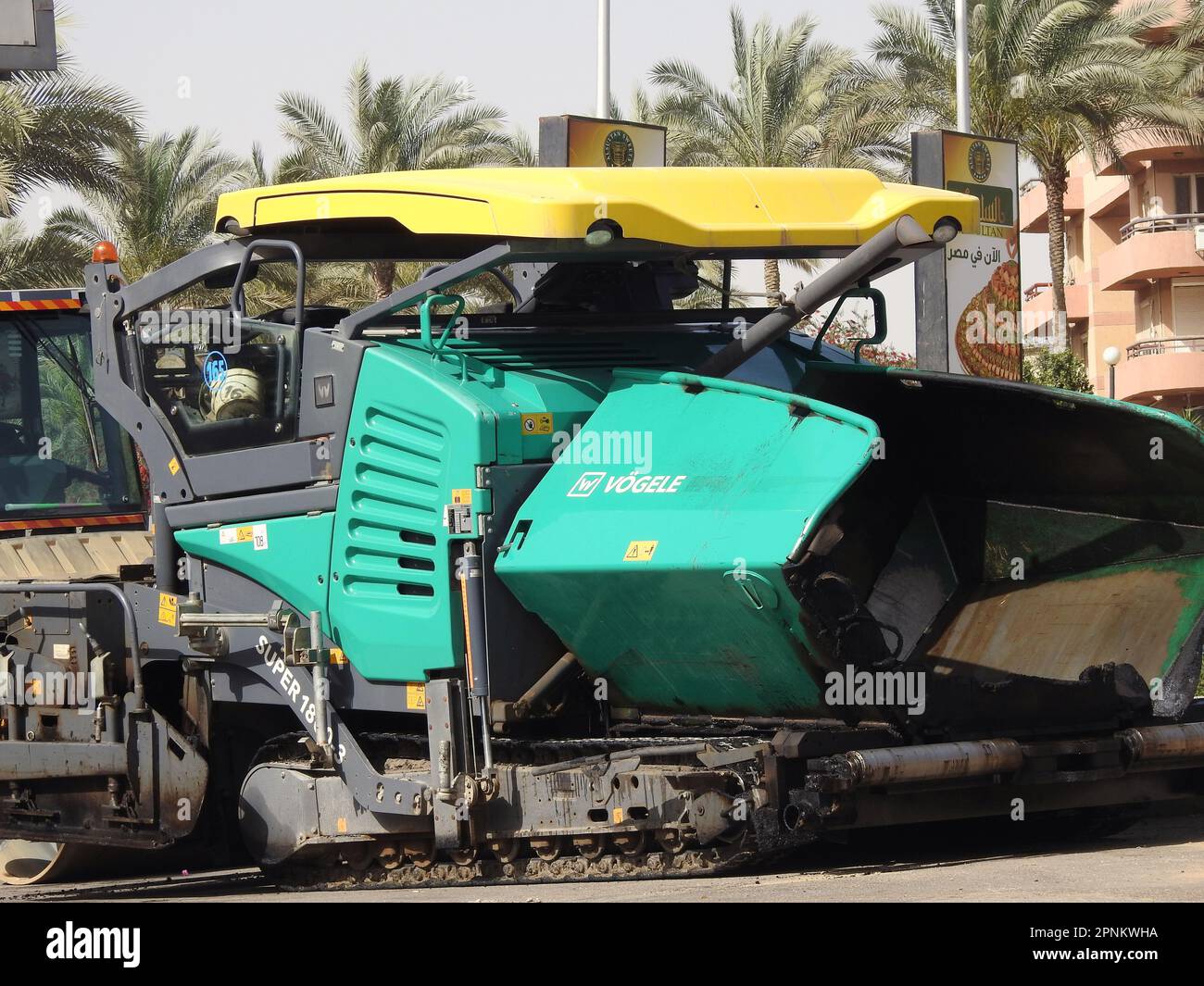 Cairo, Egypt, April 18 2023: Track asphalt paver truck, A paver (road ...