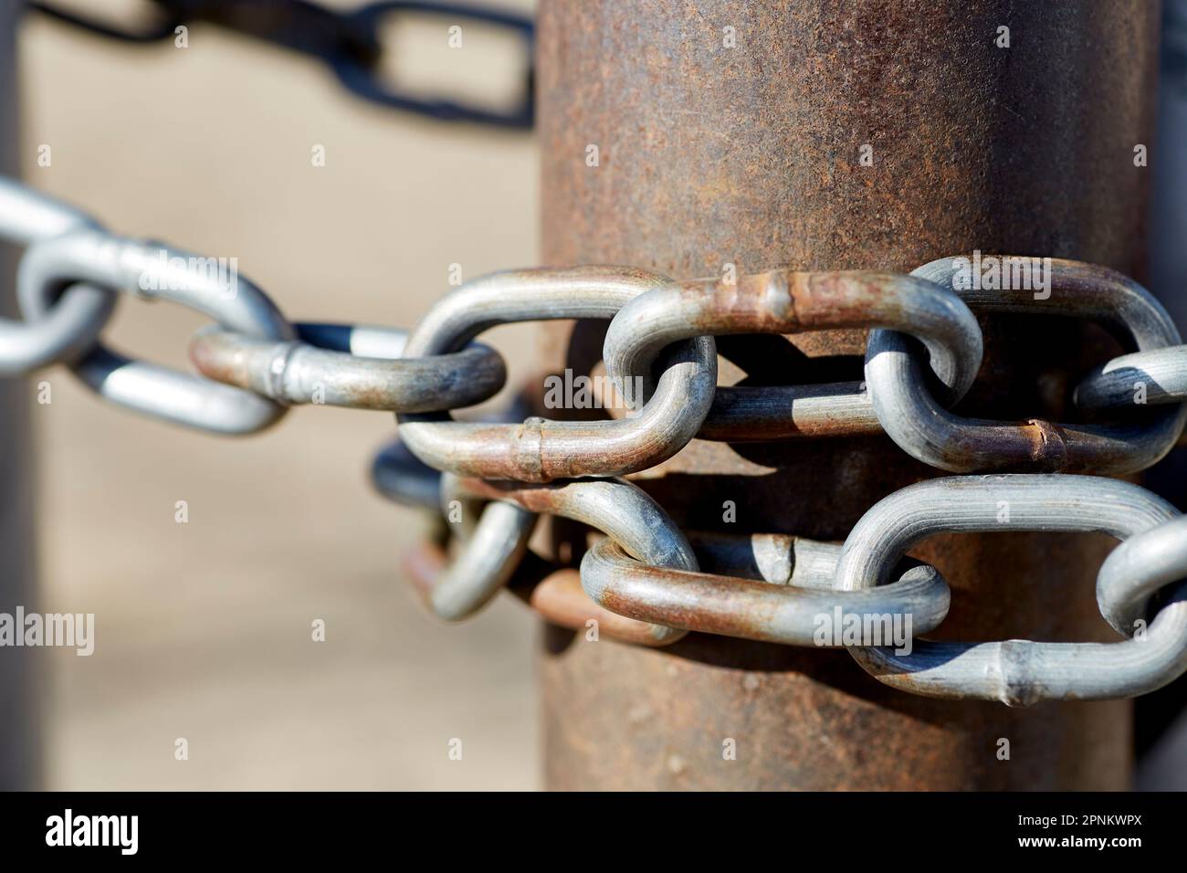 Close up of a Steel Gate Chain around a Rusted Pipe Stock Photo - Alamy
