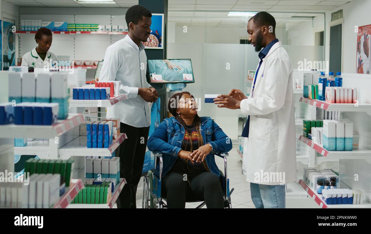 Pharmacist talking to patients hi-res stock photography and images - Alamy
