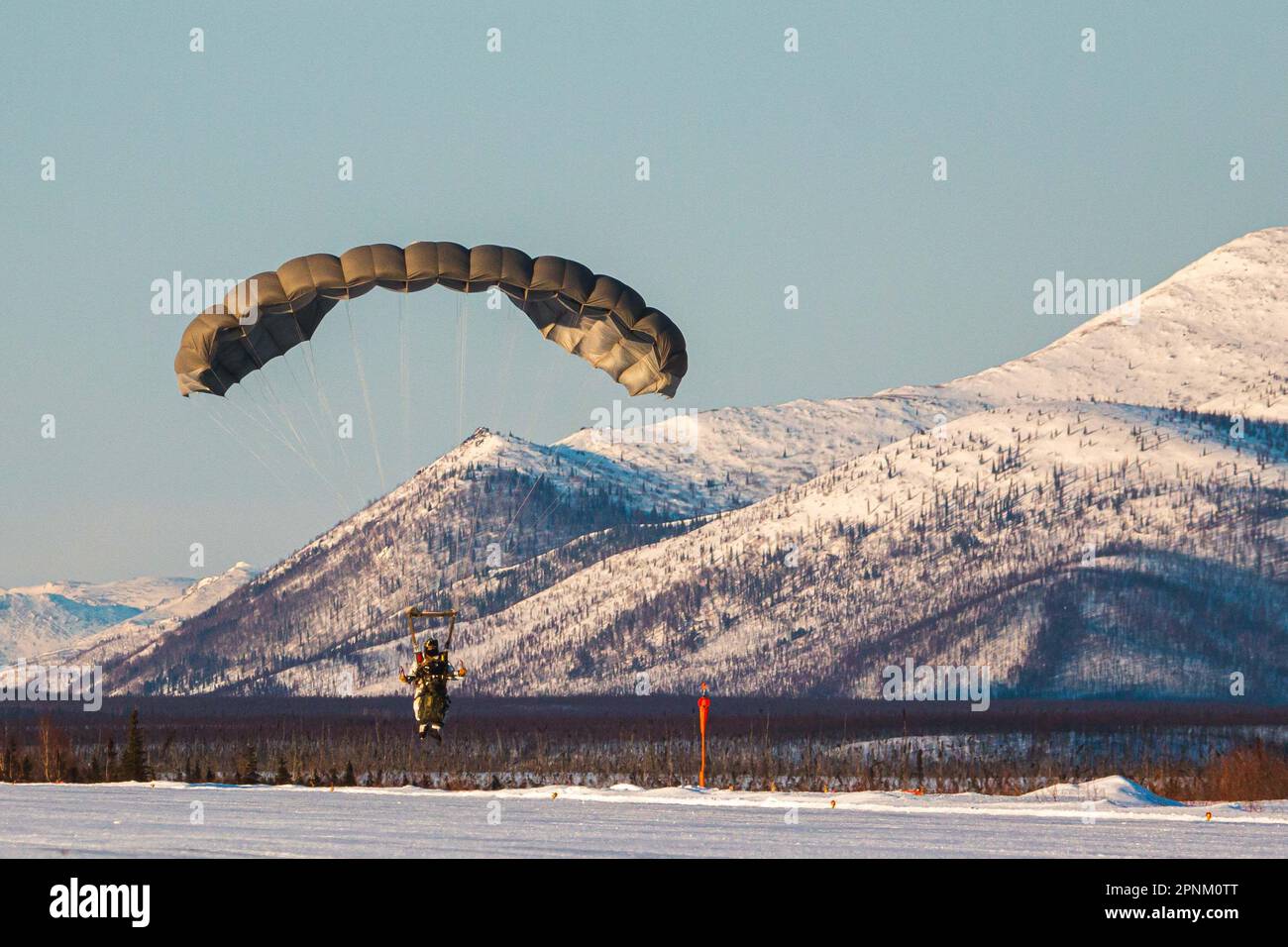 A 10th Special Forces Group (Airborne) Green Beret prepares to land ...