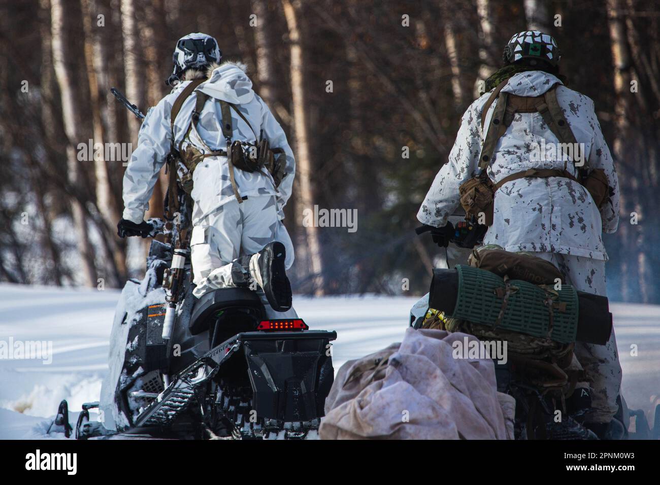 10th Special Forces Group (Airborne) Green Berets perform snow mobile ...