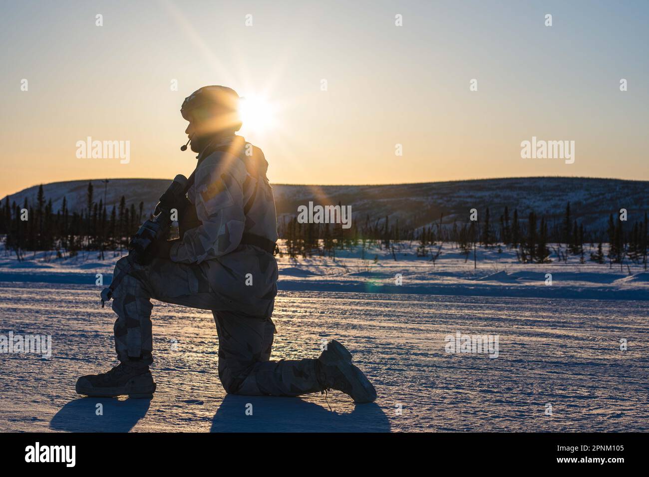 A Canadian Soldier provides security after conducting freefall ...