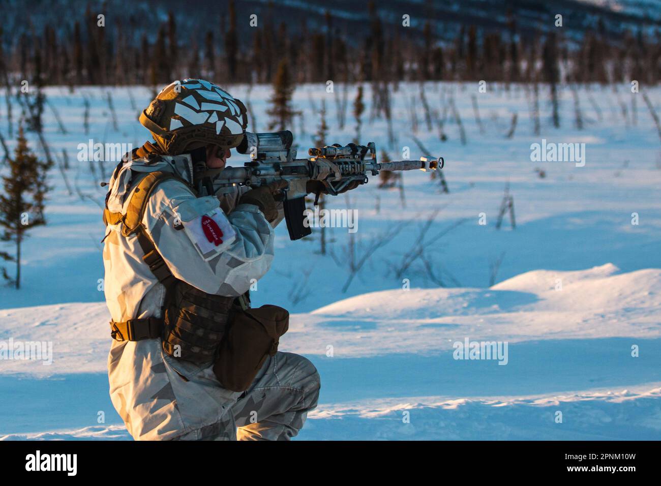 A Canadian Soldier provides security after conducting freefall ...