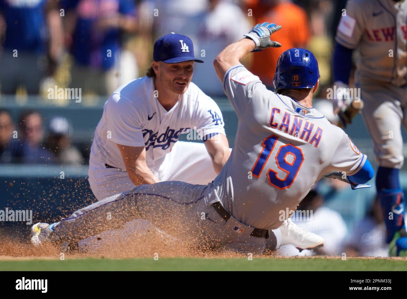 Los Angeles Dodgers relief pitcher Shelby Miller, left, tags out New ...
