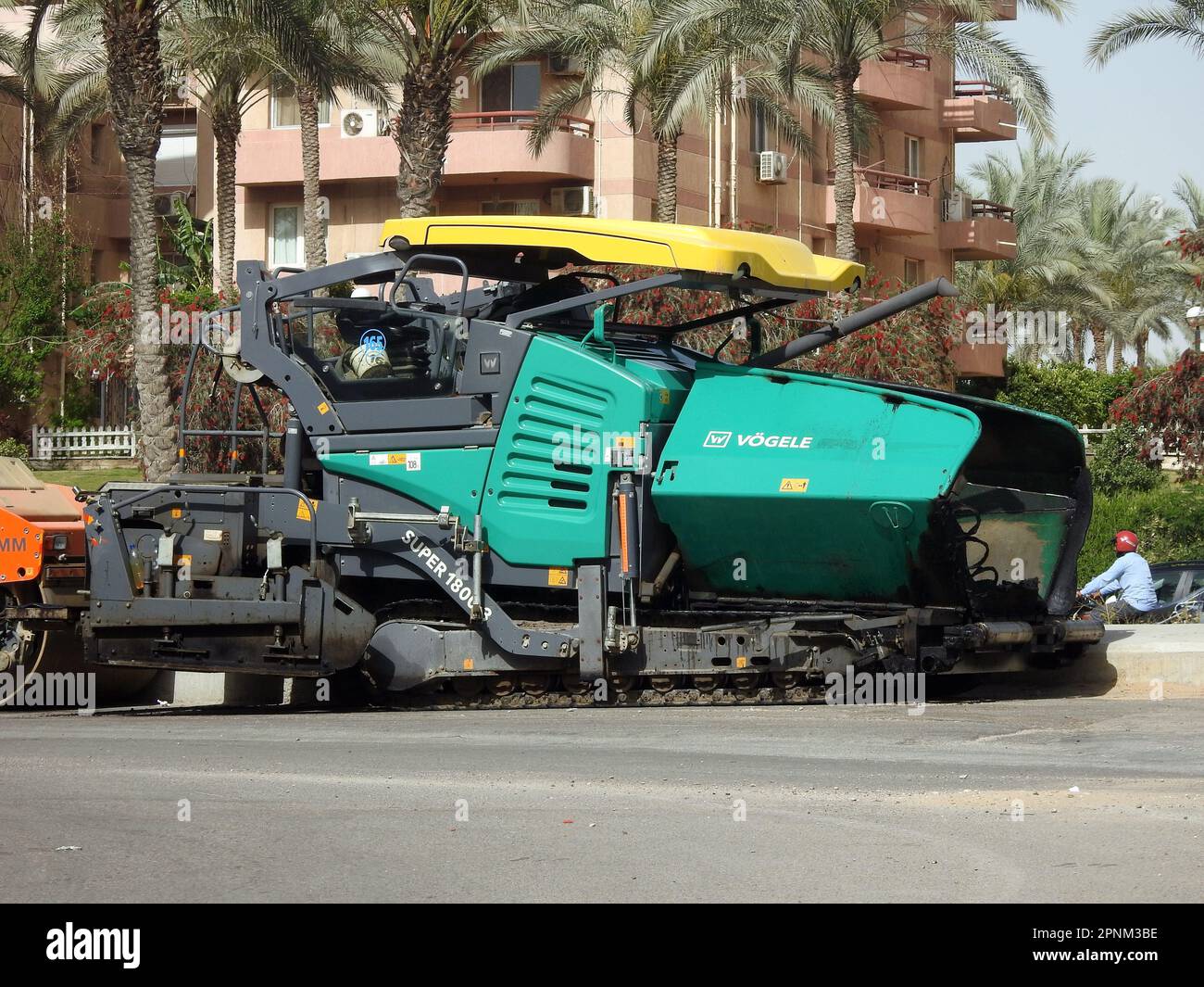 Cairo, Egypt, April 18 2023: Track asphalt paver truck, A paver (road ...